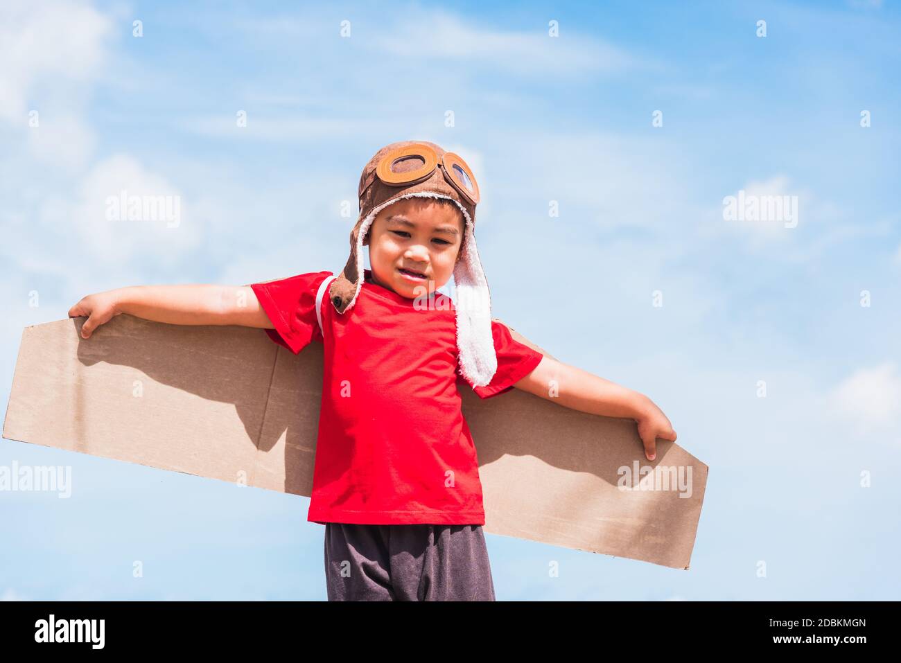 Happy Asian funny child or kid little boy smile wear pilot hat play and ...