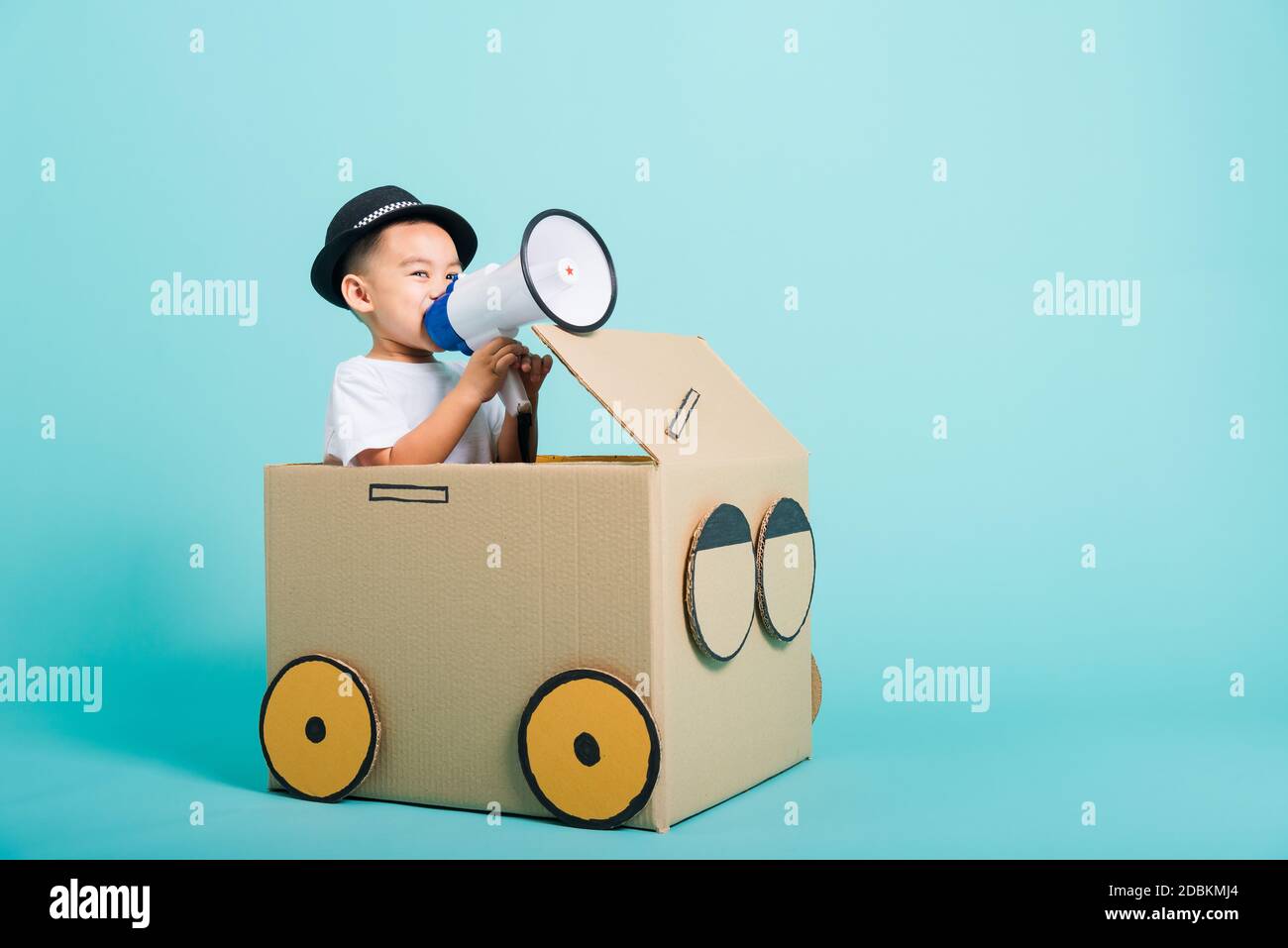 Happy Asian children boy smile in driving play car creative by a ...