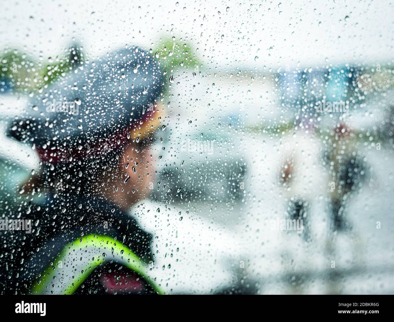 policewoman on traffic security in rainy weather Stock Photo - Alamy