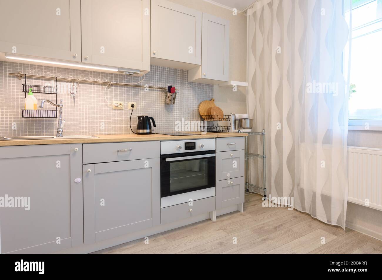 Kitchen interior with a beautiful kitchen set Stock Photo - Alamy