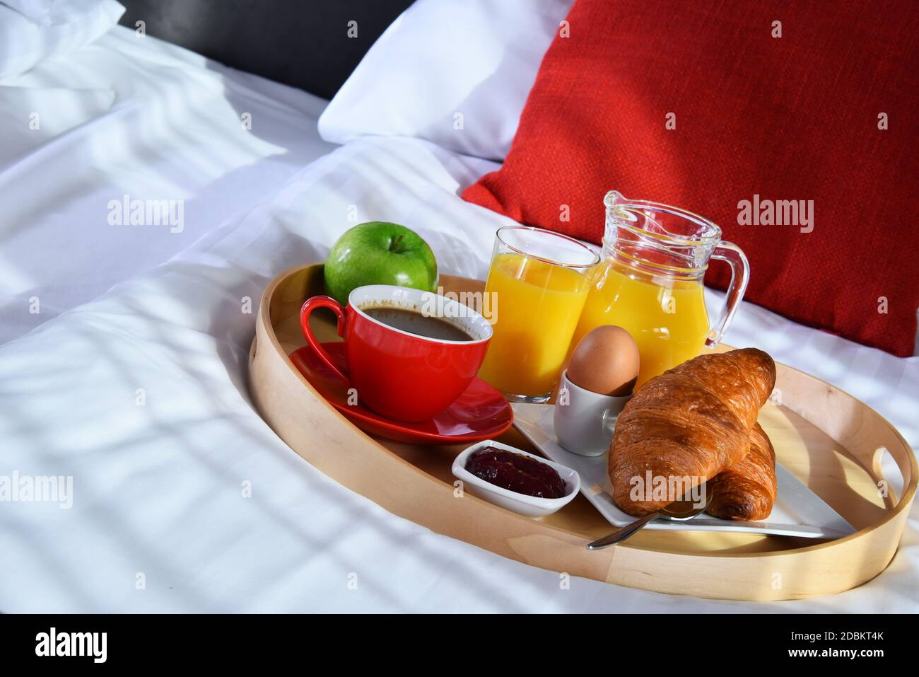 Breakfast on tray in bed in hotel room Stock Photo - Alamy