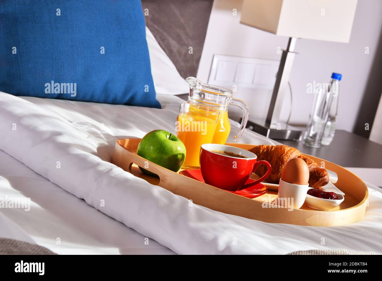 Breakfast on tray in bed in hotel room Stock Photo - Alamy