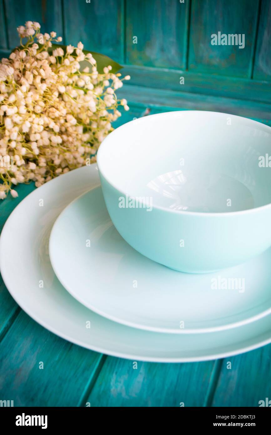 Spring table setting with vintage blue teal cutlery and lily of the ...