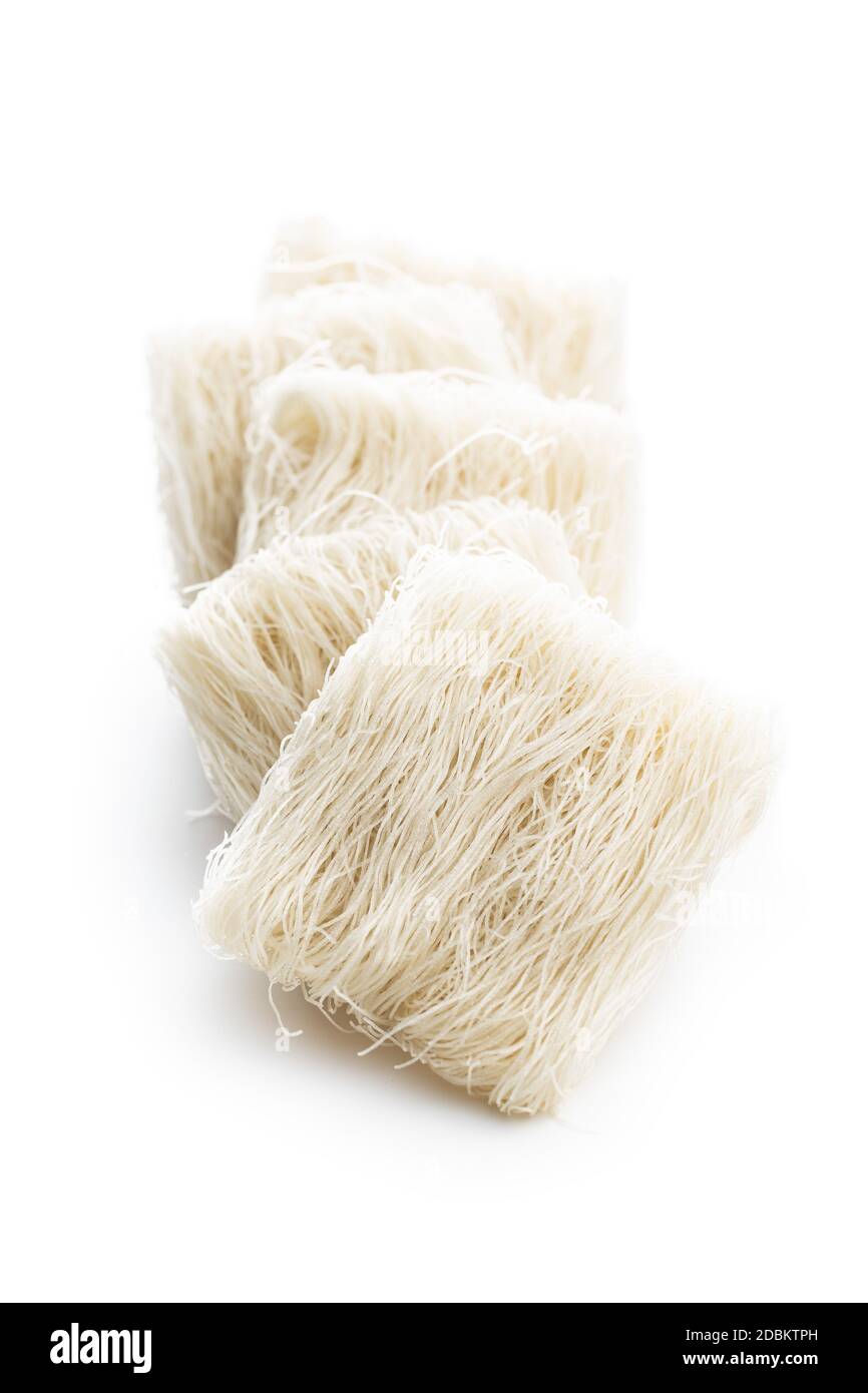 Uncooked white rice noodles isolated on white background Stock Photo ...