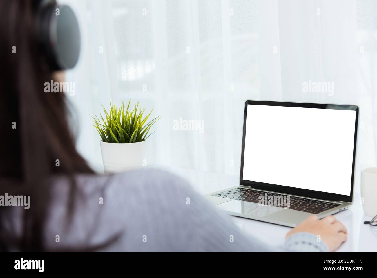 Work from home, Back of Asian young businesswoman video conference call ...