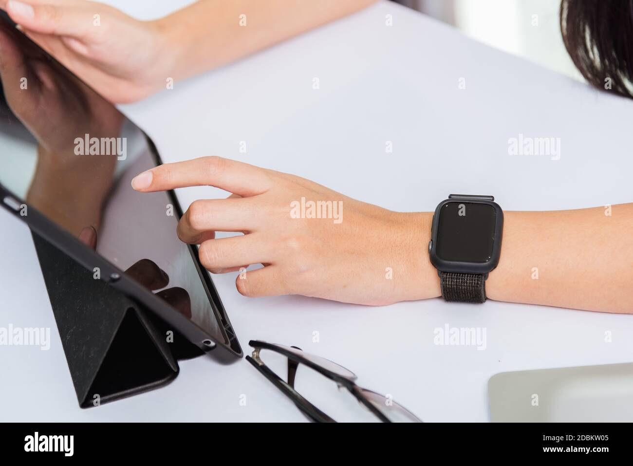 Work from home, Happy Asian young businesswoman use hand finger touch ...