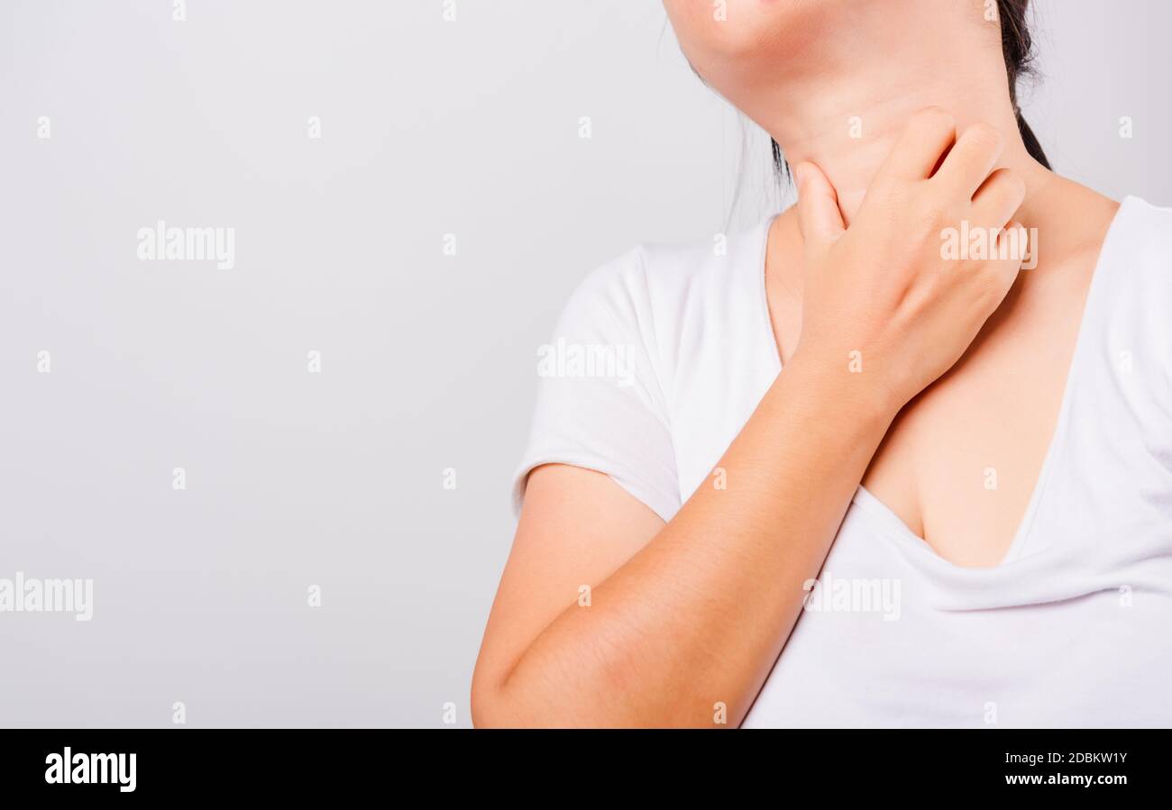 Asian beautiful woman itching her useing hand scratch itch neck on ...