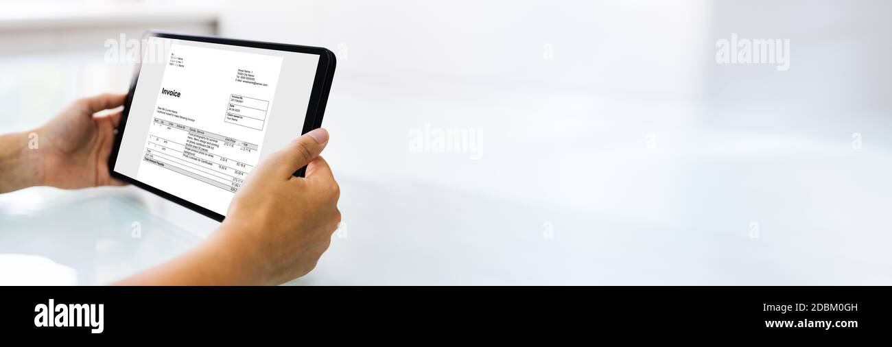 Electronic Invoice And Accounting Software On Tablet Stock Photo - Alamy