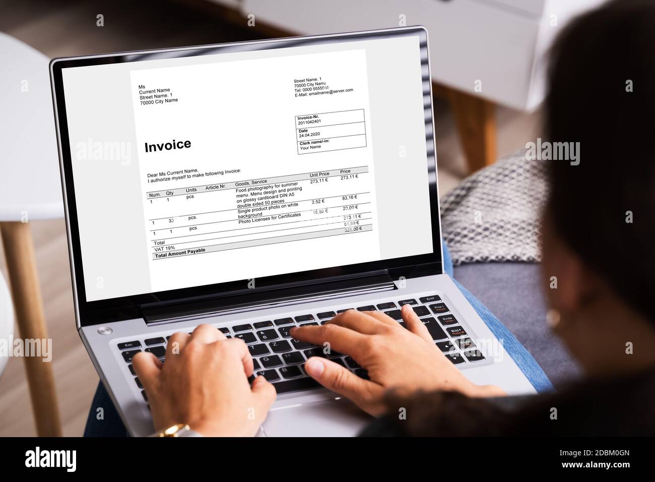 Online Invoice Management. Young Accountant Doing Audit Stock Photo - Alamy