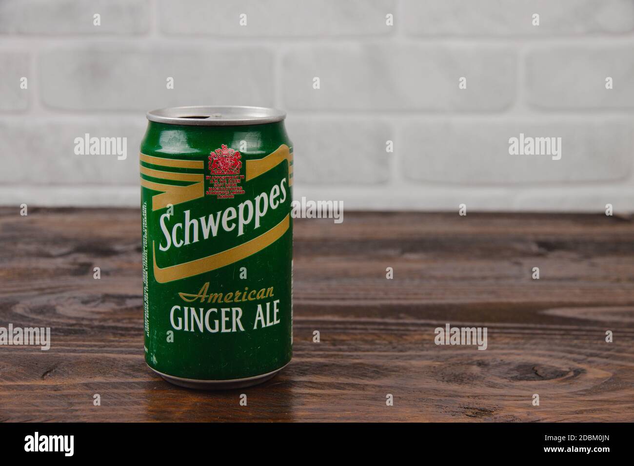 An old aluminium can of Schweppes beer against the brick wall Stock ...