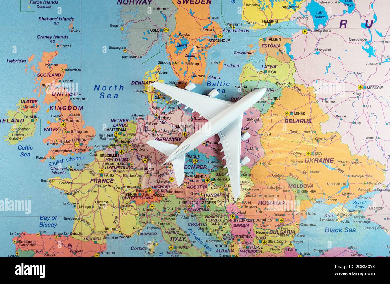 Toy of a plane on the Europe map Stock Photo - Alamy