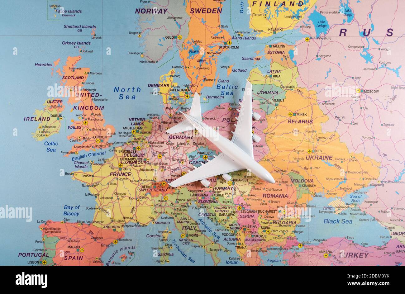 Toy of a plane on the Europe map Stock Photo - Alamy