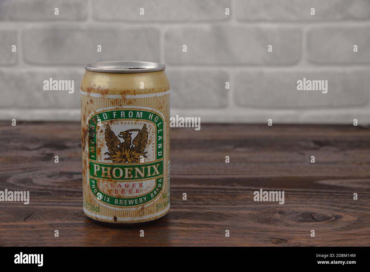 An old aluminium can of Phoenix beer against the brick wall Stock Photo ...