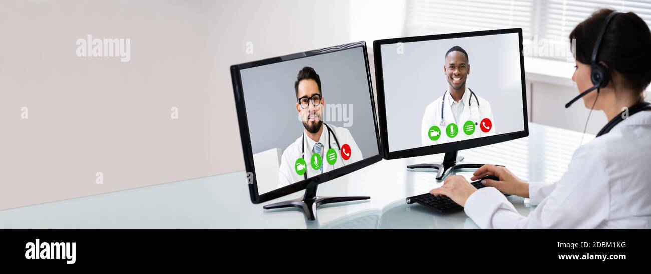 Medical Doctor Using Online Elearning Video Conference Technology Stock ...