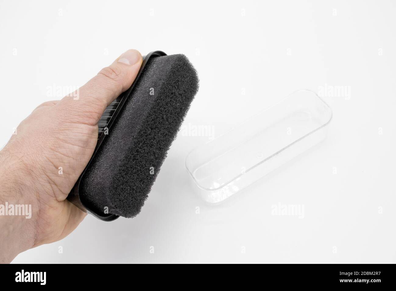 Shoe cleaning sponge isolated on white background Stock Photo - Alamy