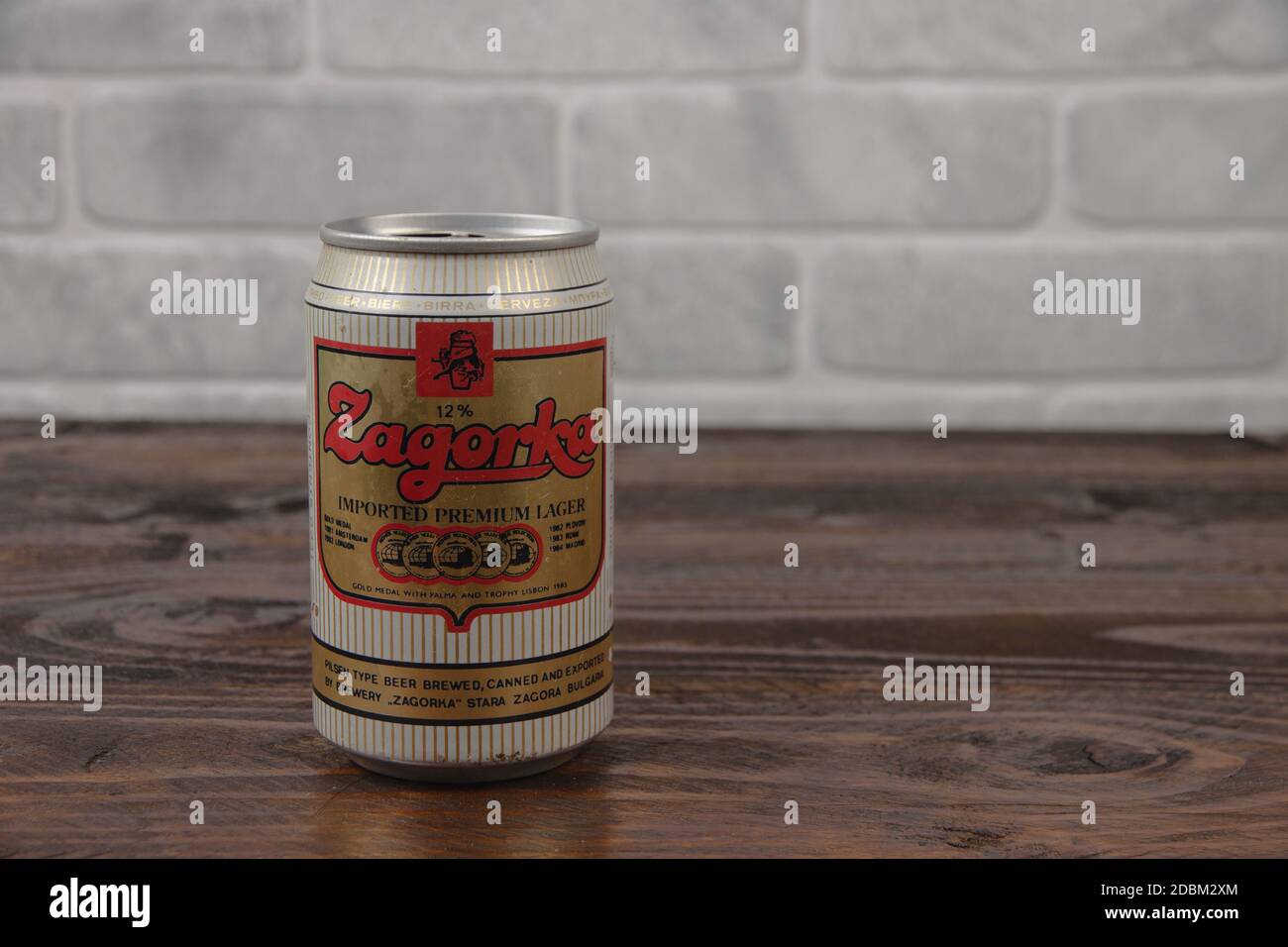 An old aluminium can of Zagorka Bulgarian lager beer against the brick ...