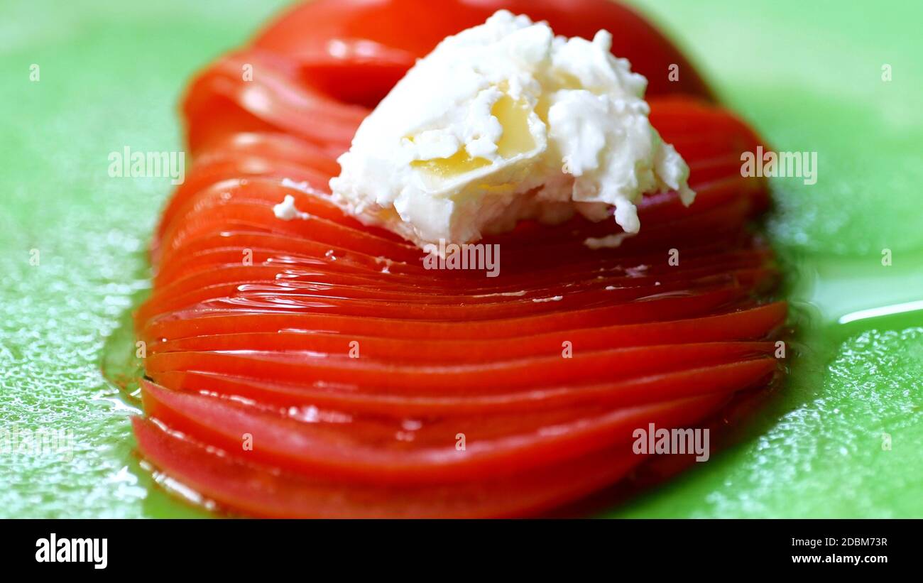 Olive Oil Over Tomato Slices Stock Photo - Alamy