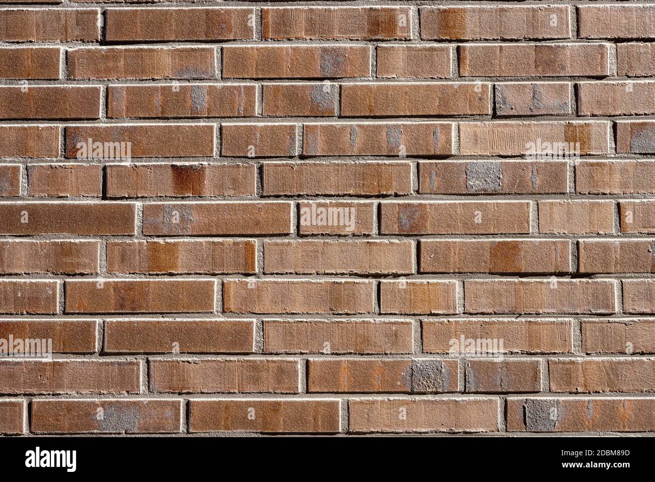 Background from a wall made of brown bricks Stock Photo - Alamy