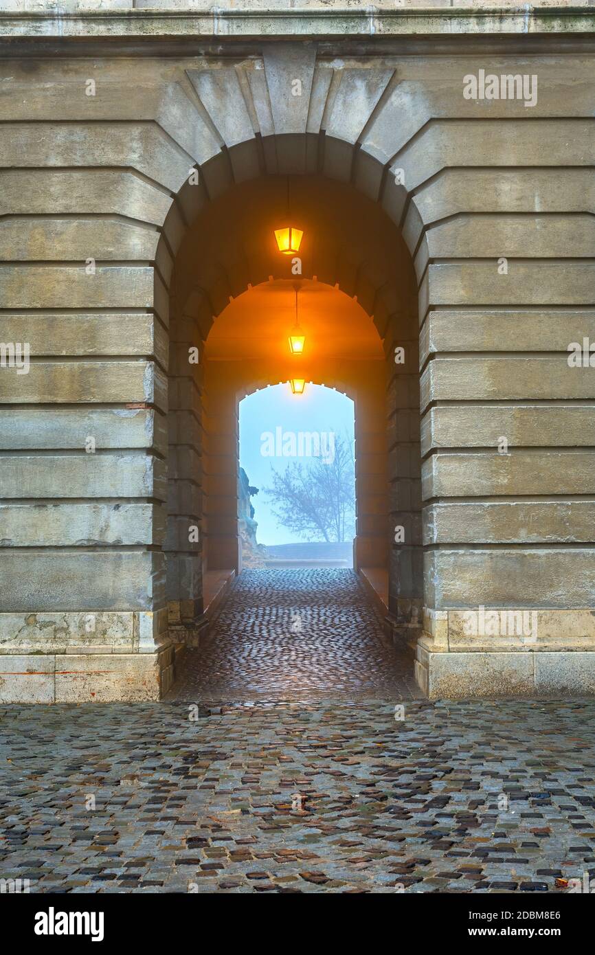 Gate in Buda castle at foggy morning, Budapest Stock Photo - Alamy