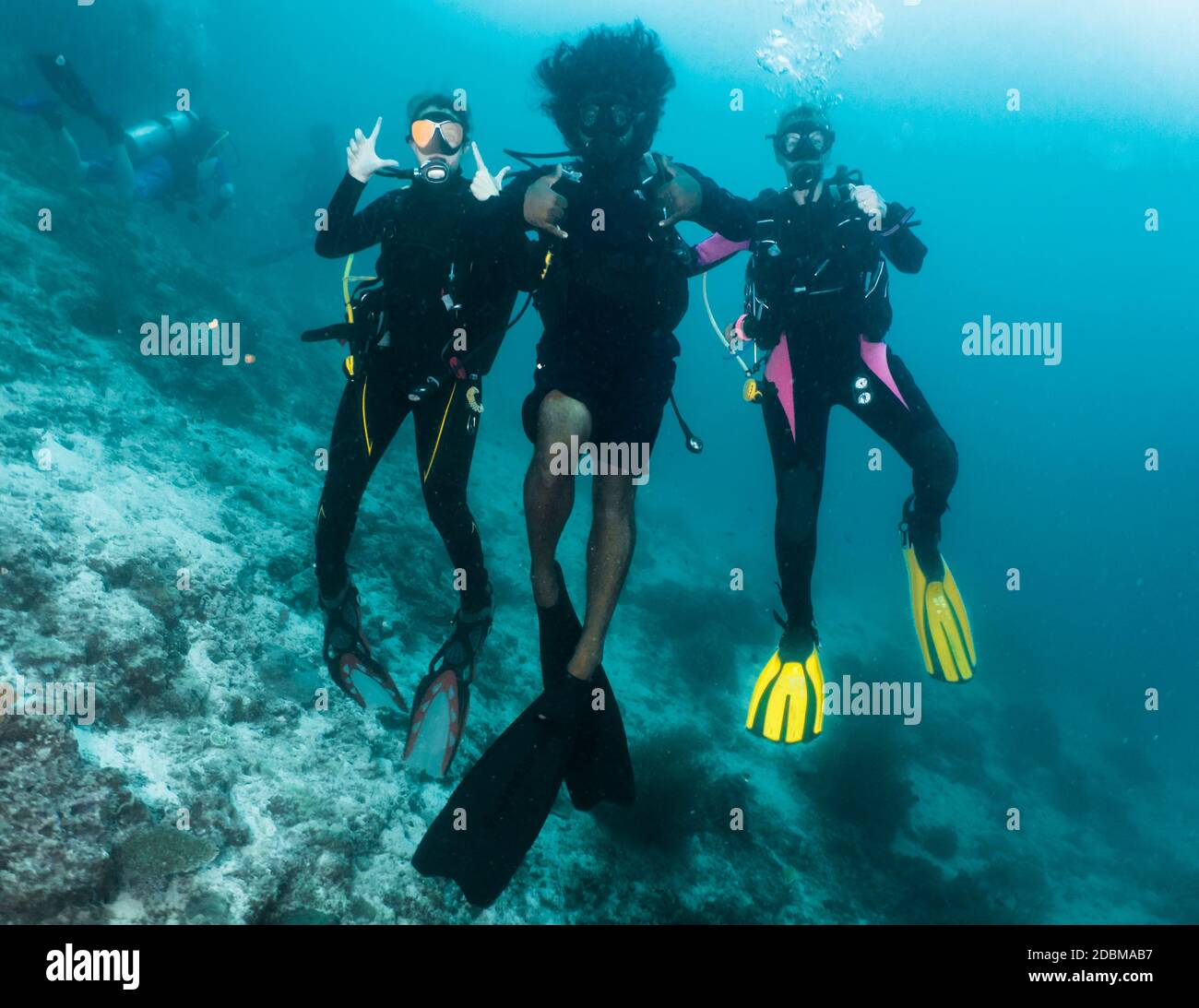 Three scuba divers inÃ‚Â AriÃ‚Â Atoll, Maldives Stock Photo - Alamy