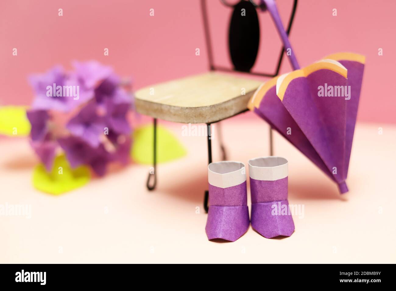 Cute origami rain goods, umbrella and boots image of rainy season Stock ...
