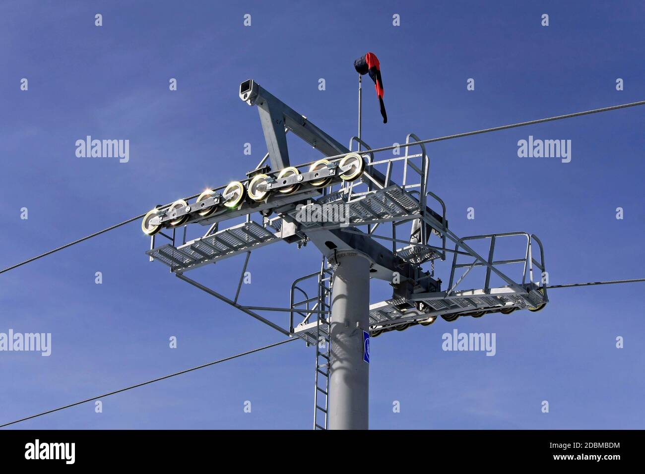 Pole and gears for cable chair ski lift Stock Photo - Alamy