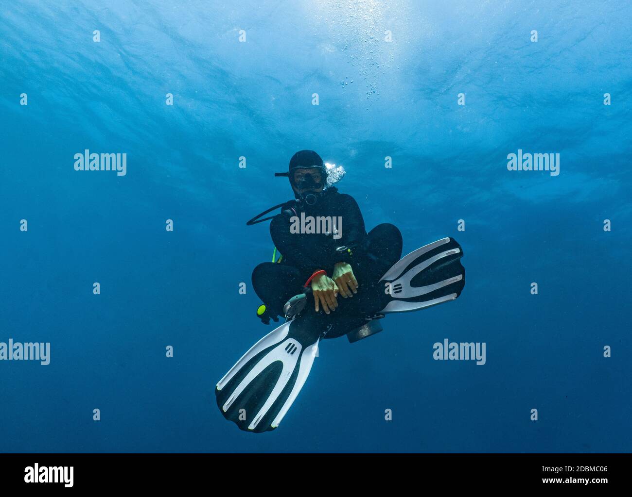female diver relaxing at the 5 meter /15 feet 3 minute safety stop ...