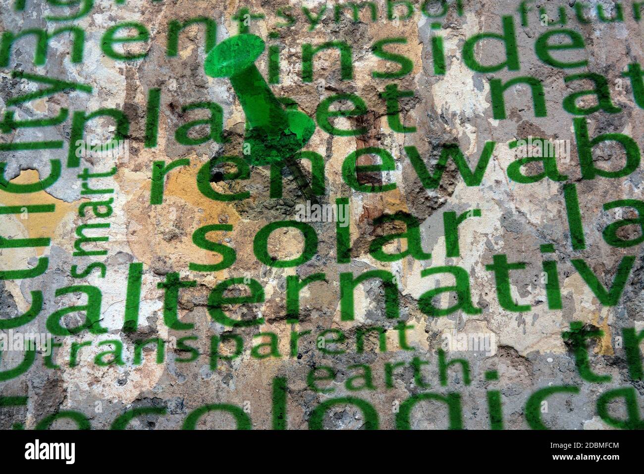 Renewable energy text on wall Stock Photo - Alamy