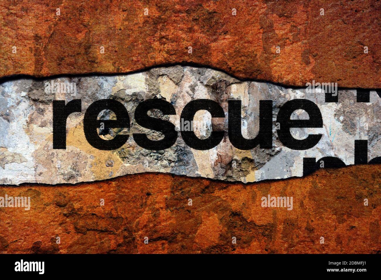 Rescue text on wall Stock Photo - Alamy