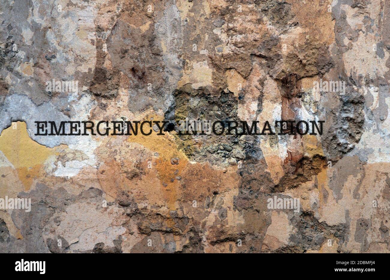 Emergency information text on wall Stock Photo - Alamy