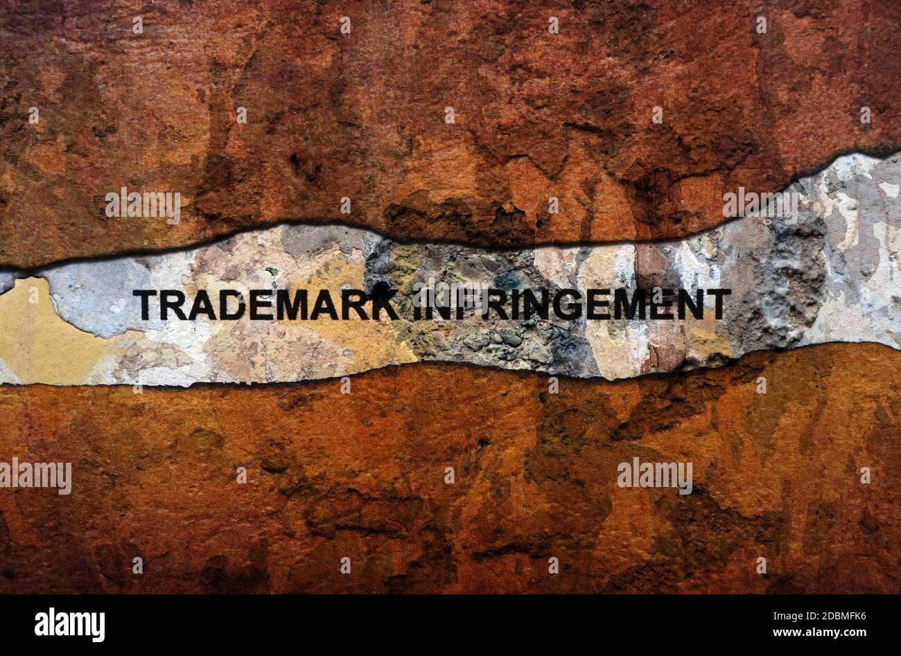 Trademark infringement text on wall Stock Photo - Alamy