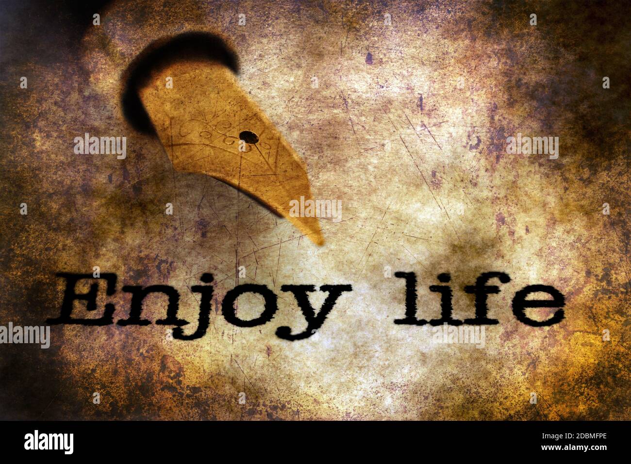Enjoy life text and pen Stock Photo - Alamy