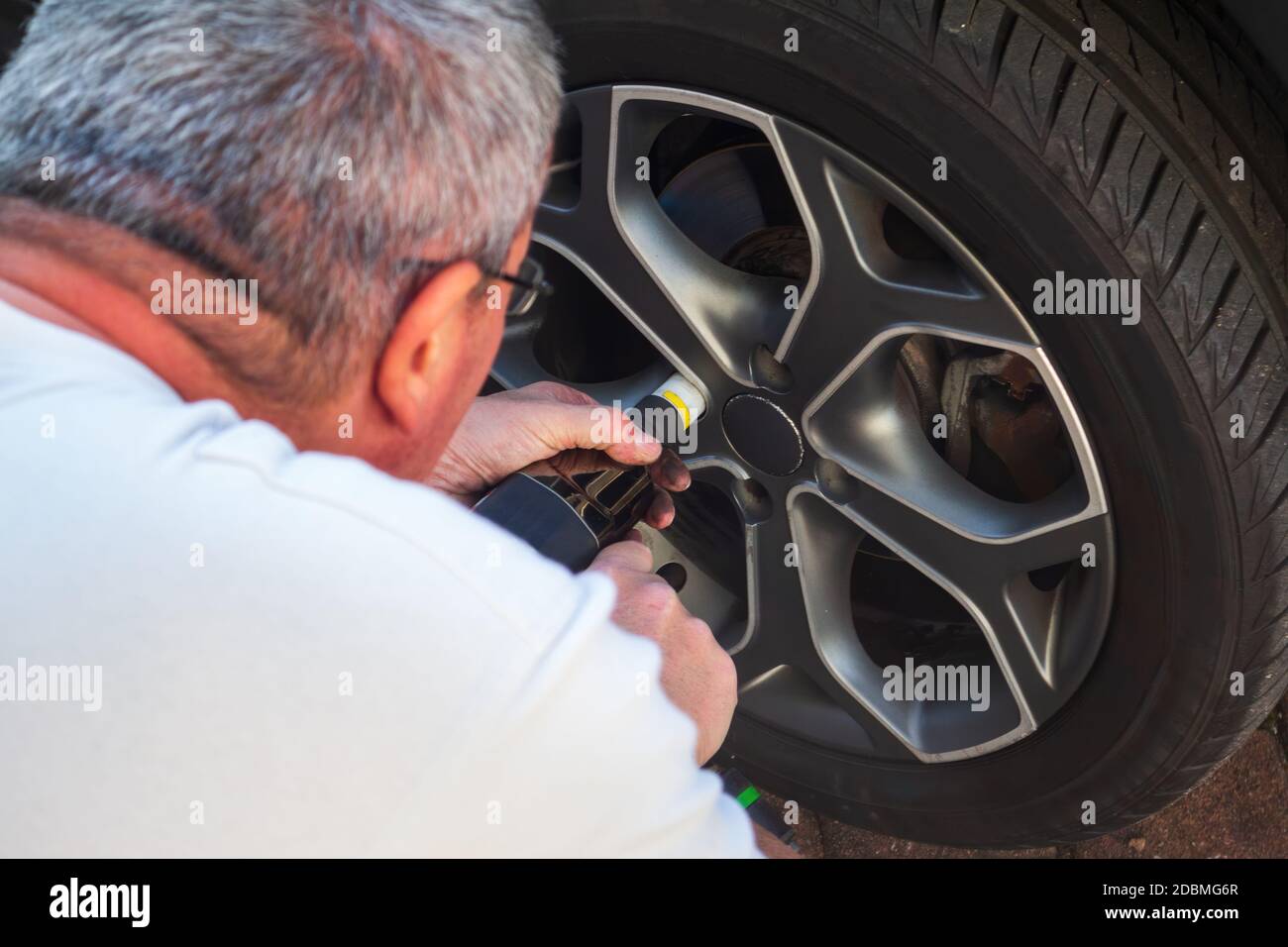 Man fixing car home hi-res stock photography and images - Alamy