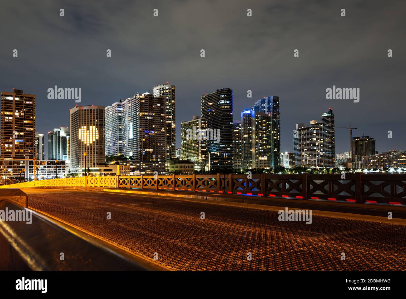 Miami, sunset panorama with colorful illuminated business and ...