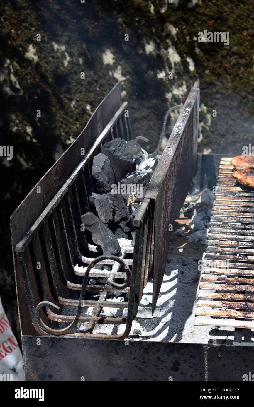 Steaming coal on the grill Stock Photo - Alamy