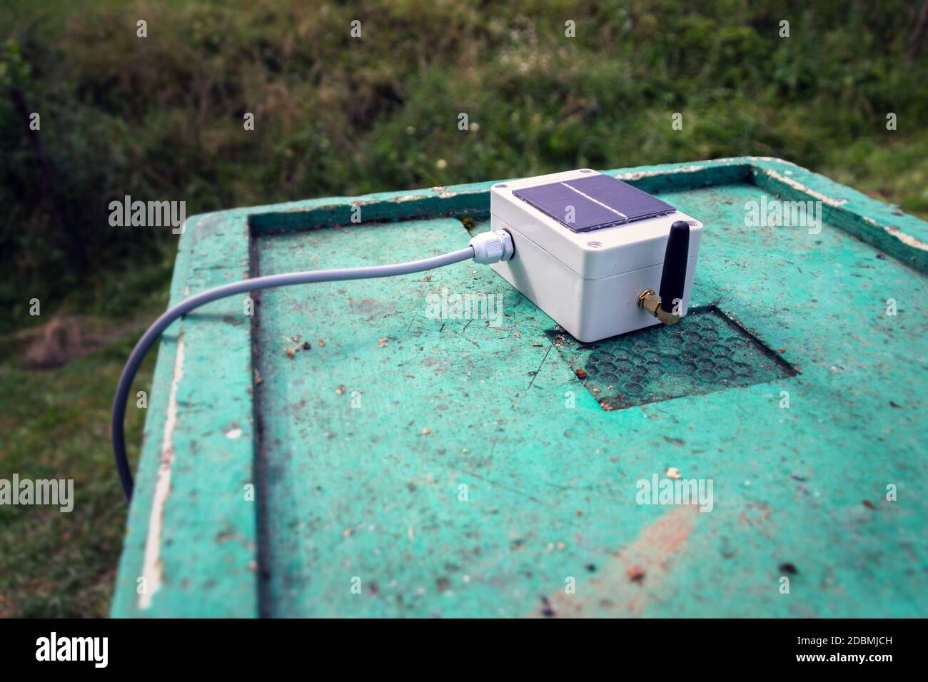 White transmitter with small solar panel and bees monitoring system on ...