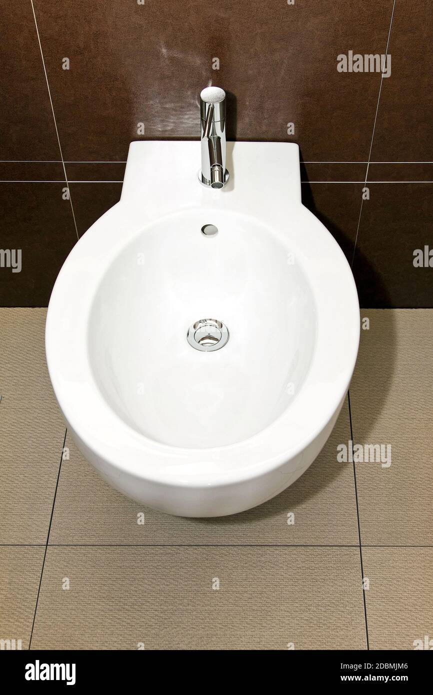 Close up shot of oval bidet wash basin Stock Photo - Alamy