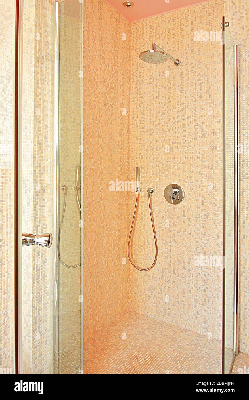 Interior shot of shower with contemporary tiles Stock Photo - Alamy