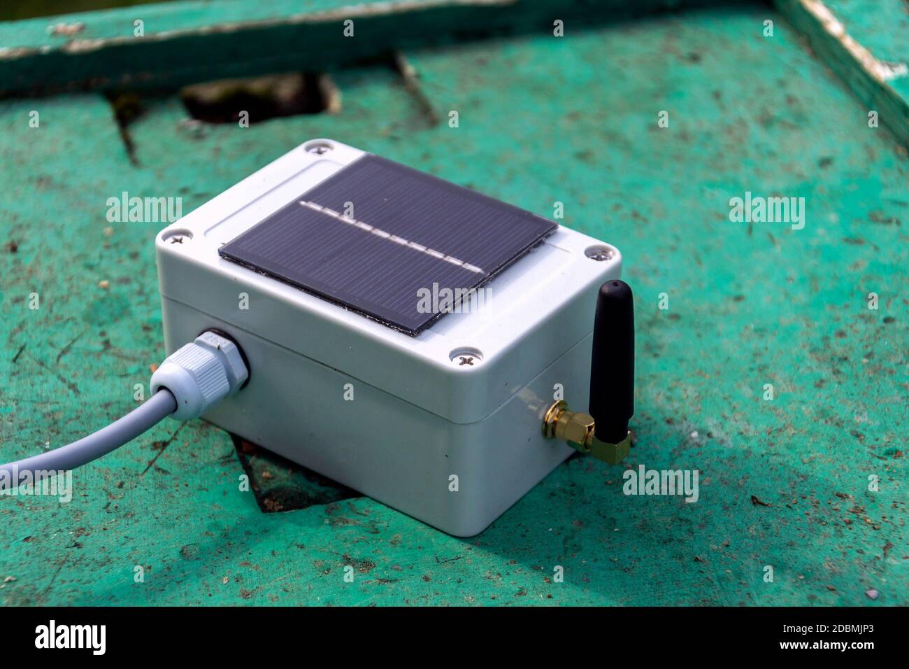 White transmitter with small solar panel and bees monitoring system on ...
