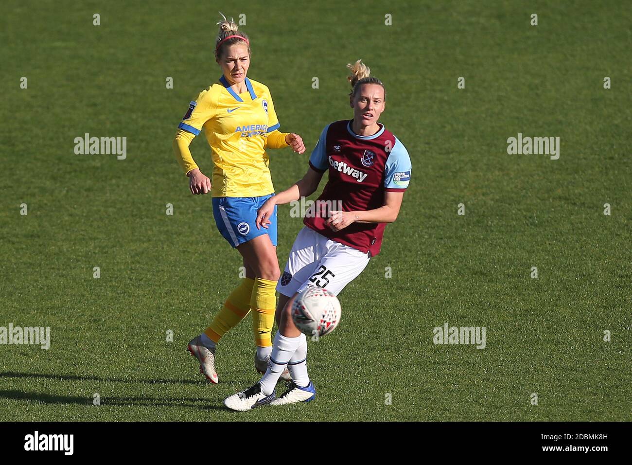 Emily van Egmond of West Ham and Emily Simpkins of Brighton during West ...
