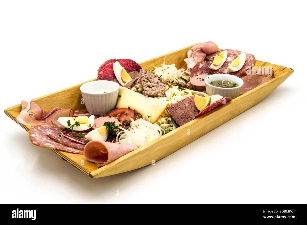 Rustic sausage platter of salted and sliced meats Stock Photo - Alamy