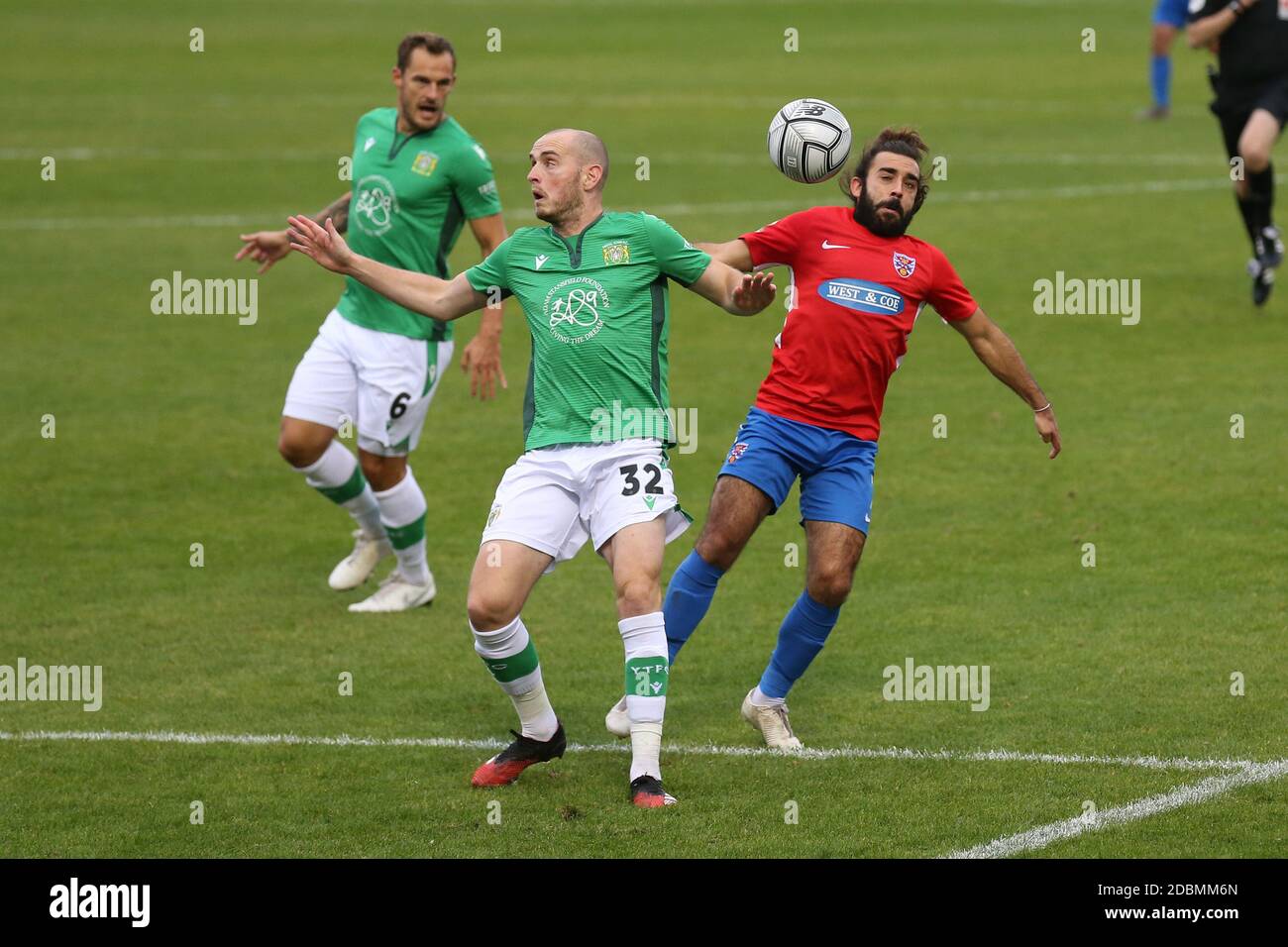 Sam Deering of Dagenham and Redbridge and Josh Staunton of Yeovil Town ...