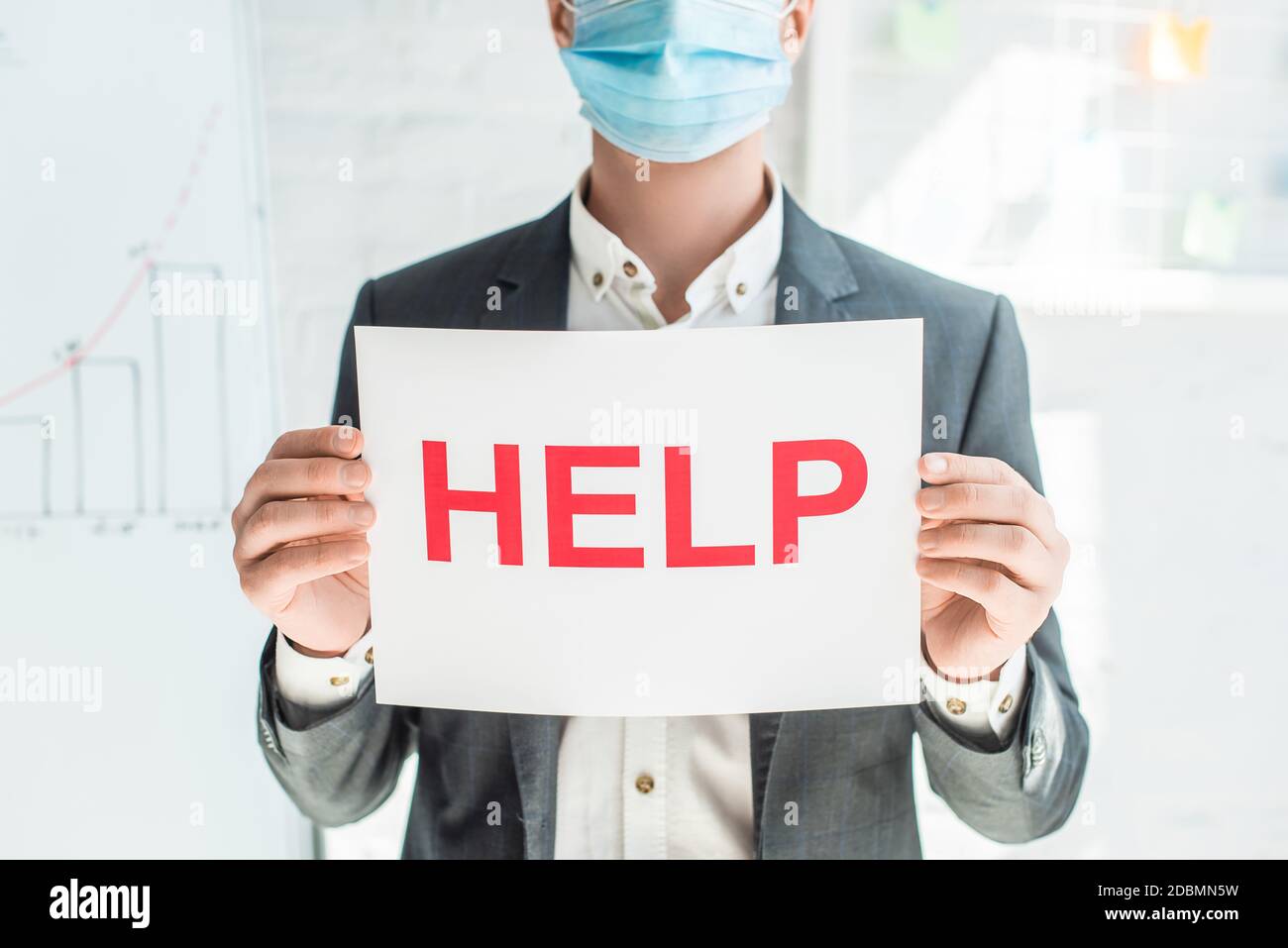 Man holding help me sign hi-res stock photography and images - Alamy