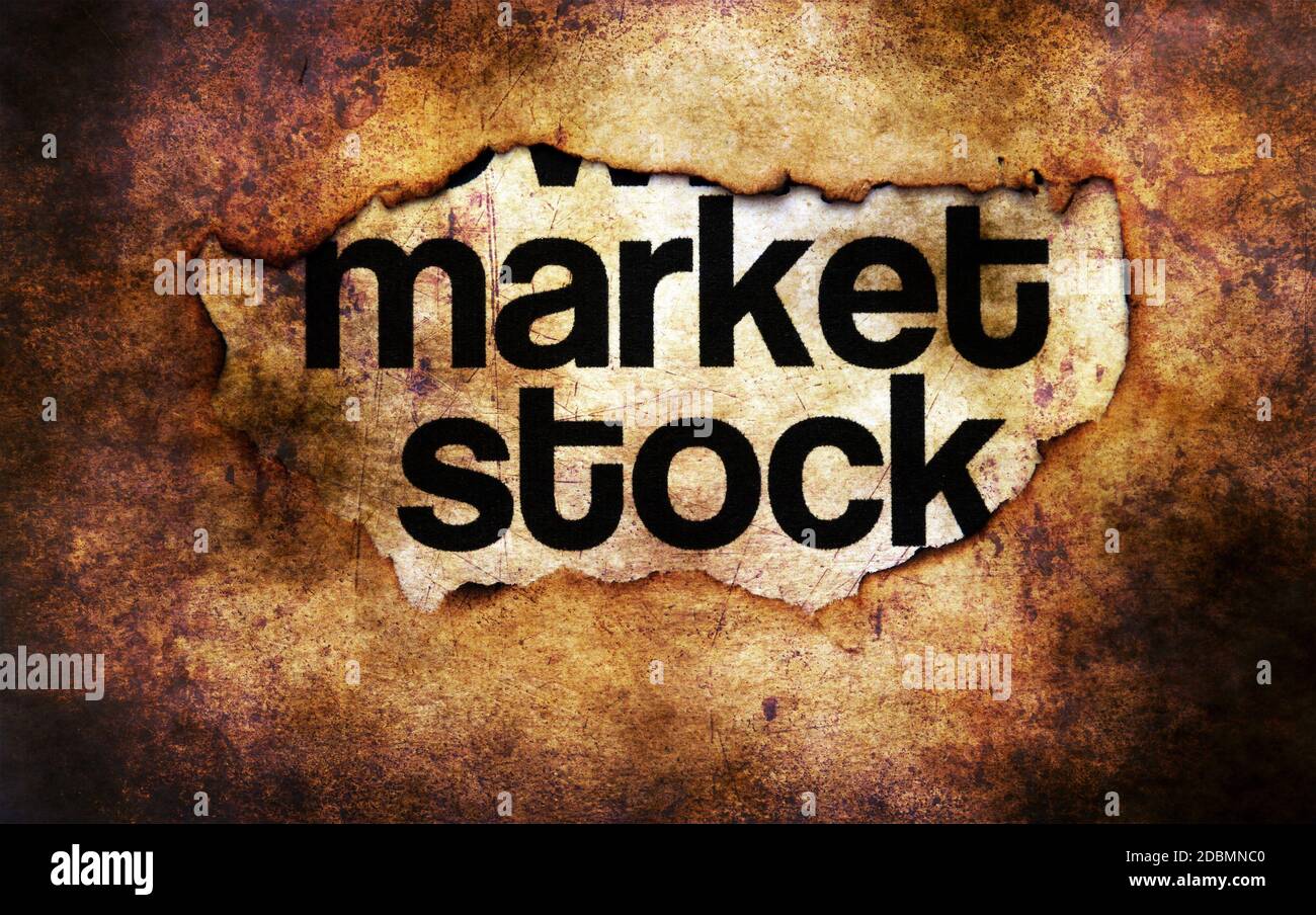 Market stock on paper hole grunge concept Stock Photo - Alamy