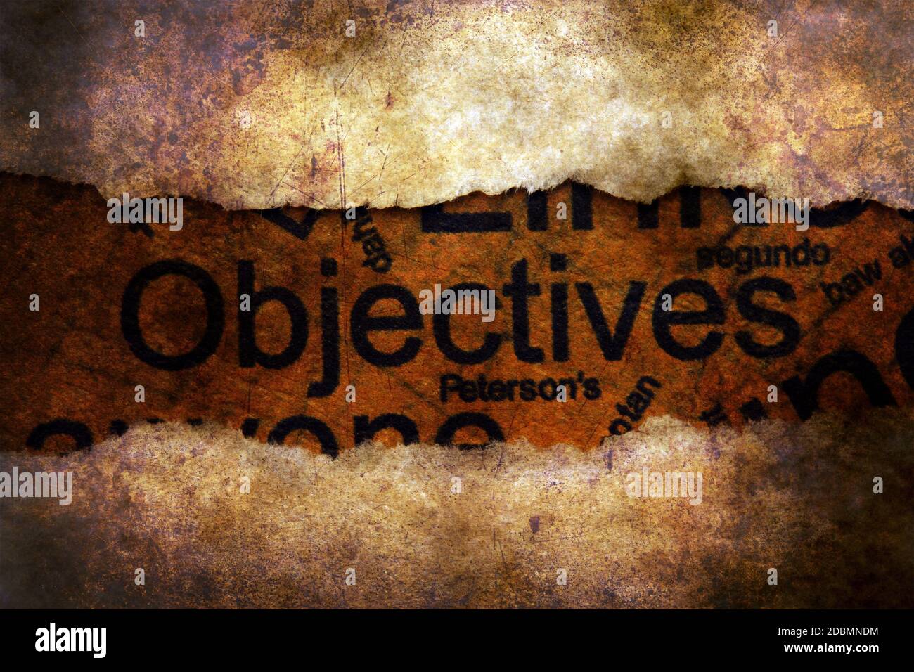 Objectives concept on paper hole Stock Photo - Alamy