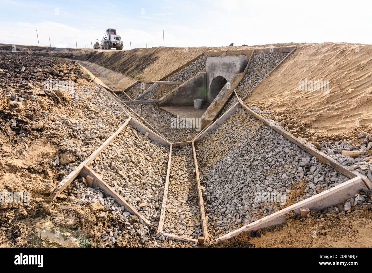 Construction of a drainage ditch along a new road being built Stock ...