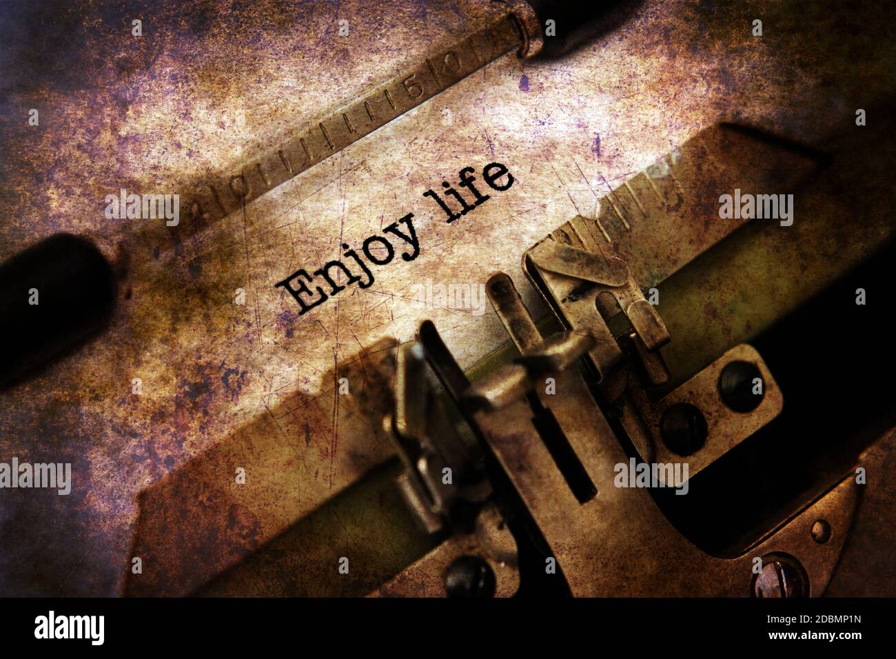 Enjoy life text on vintage typewriter Stock Photo - Alamy