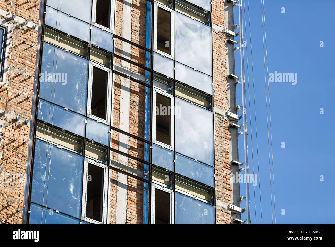 facade window installation construction site Stock Photo - Alamy