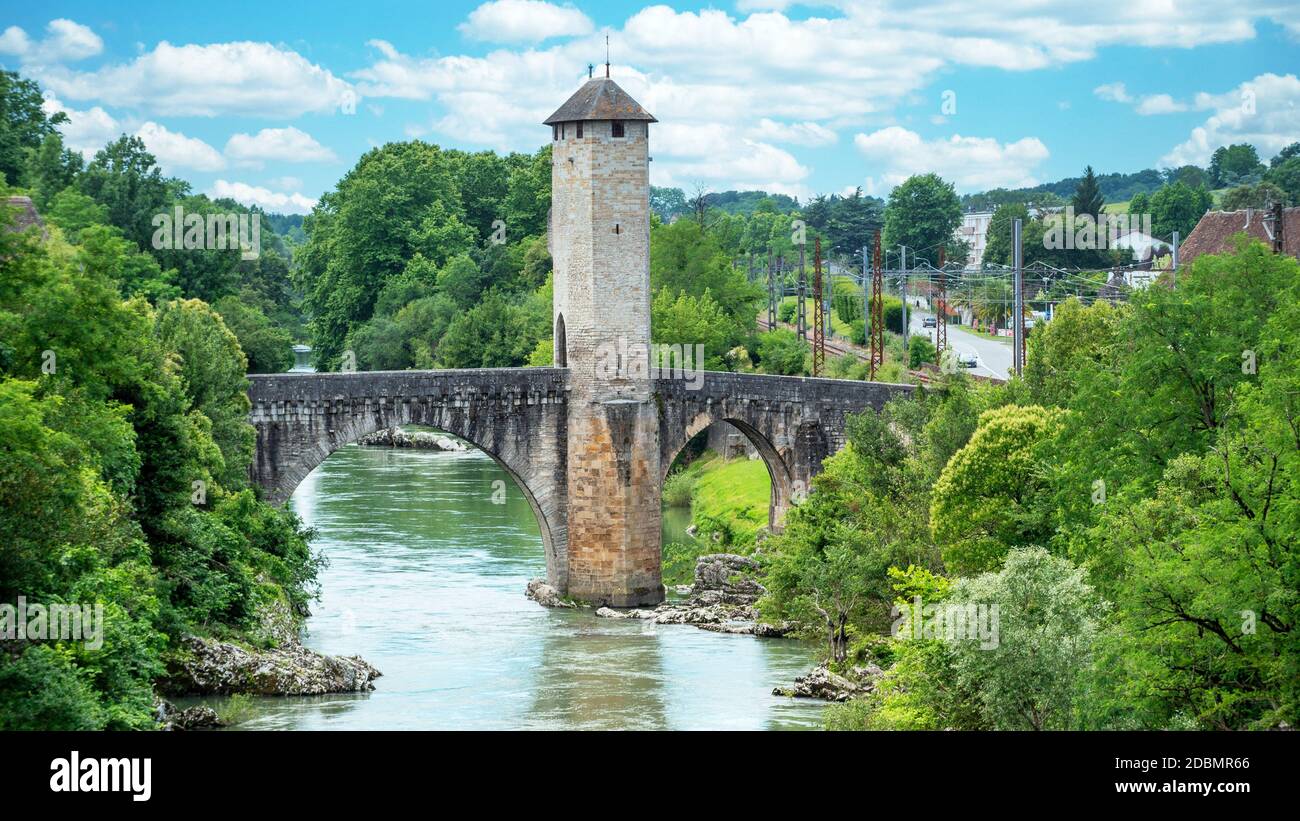 medieval bridge over river Gave de Pau in Orthez city - France Stock ...
