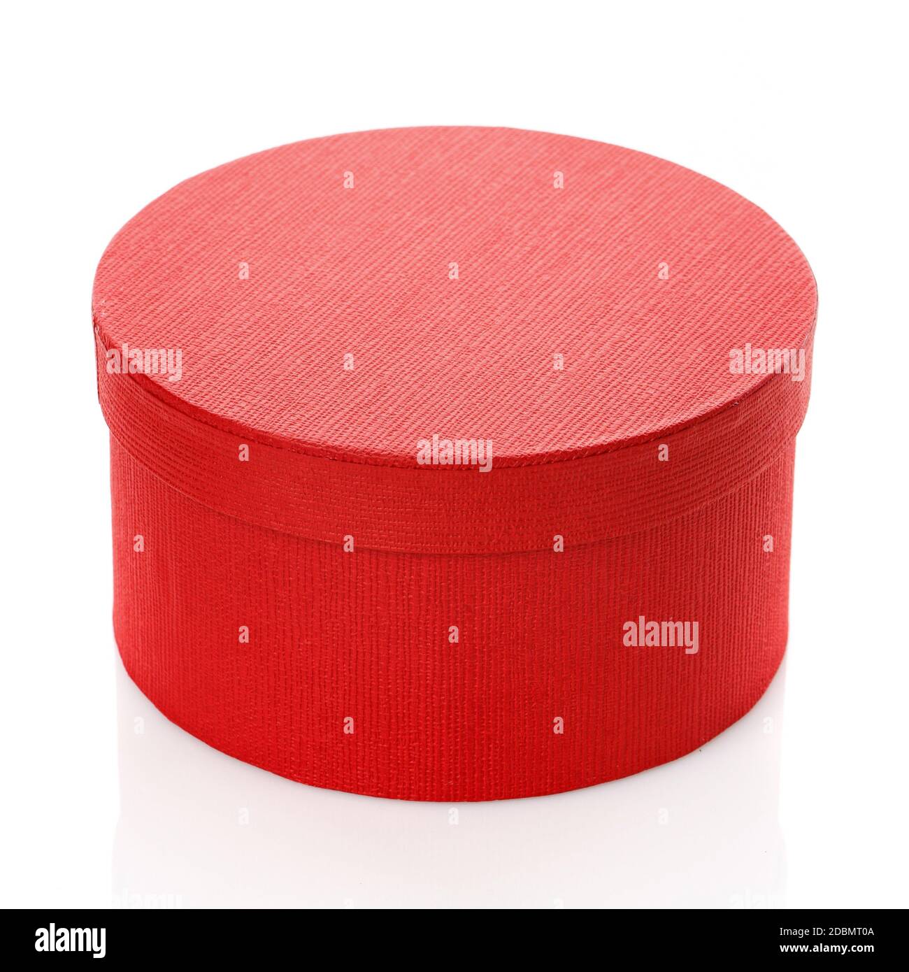 Elegant round red gift box on a white background. Side view Stock Photo ...